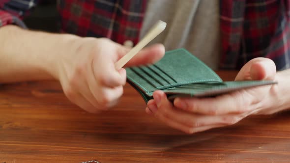 Man Tailor Repairing Wallet Made of Artificial Leather Closeup, Stock ...