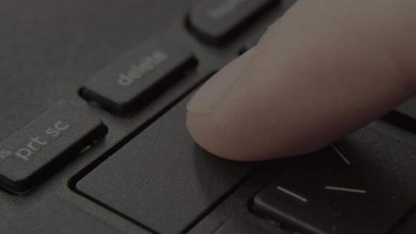 The Finger Presses the Backspace Button on the Keyboard, Stock Footage