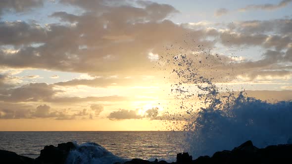 Waves Rise in the Air at Beautiful Sunset Light. Big Wave Is Crashing ...