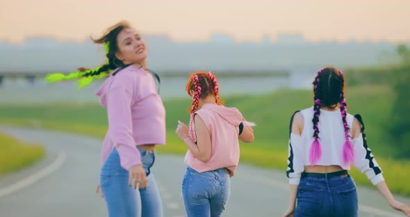 Pretty Girls Go on the Road and Dance, Stock Footage | VideoHive