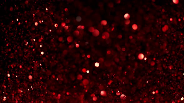 Red Glitter Explosion in Super Slow Motion Shooted with High Speed ...