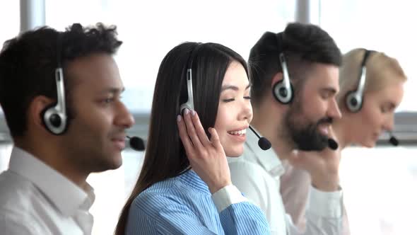 Asian Girl in Call Center Flirting., Stock Footage | VideoHive