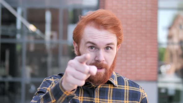 Redhead Man Pointing with Finger Outdoor, Stock Footage | VideoHive