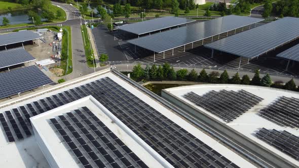 Solar panels installed in a corporate office complex parking lot and ...