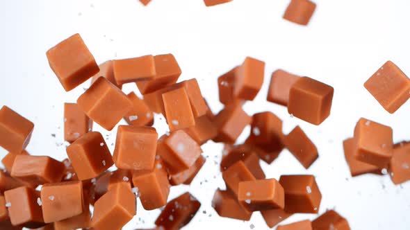 Super Slow Motion Shot of Salted Caramel Explosion Isolated on White ...