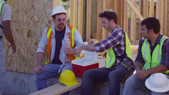 Group of construction workers taking a lunch break, Stock Footage ...