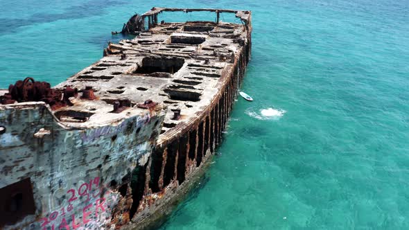 Drone Aerial View, Female Person Jumping From Shipwreck in Turquoise ...