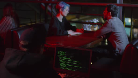 Hacker Developing Software in Cafe, Stock Footage | VideoHive