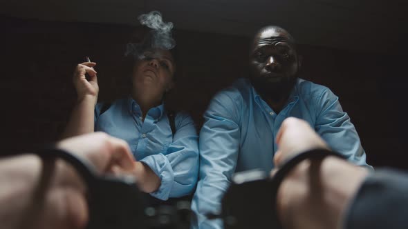 Two Diverse Police Officers Questioning Man Suspected of Committing ...