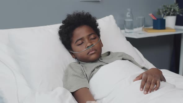 Unconscious Kid in Hospital Bed, Stock Footage | VideoHive