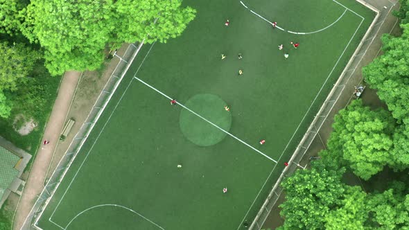 Slowmotion Overhead Upward Spiralling Shot Teams Playing Soccer on ...
