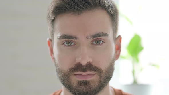 Face of Young Man Looking at the Camera, Stock Footage | VideoHive