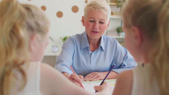 Grandma Teaching Kids Draw, Stock Footage | VideoHive