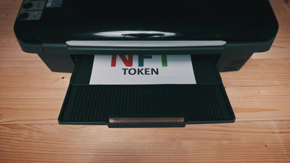 NFT Token Printing Inscription on White Sheet of Paper Printed By a Jet ...