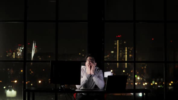 Tired Programmer Man Is Working in the Office Overtime Late at Night ...