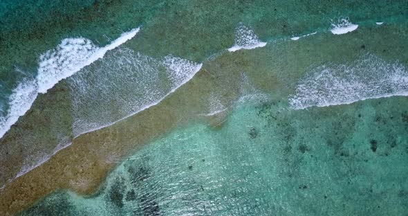 Wide angle overhead abstract view of a white paradise beach and aqua ...