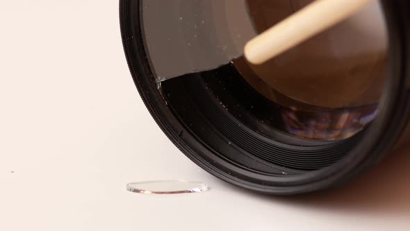 Close-up shot of a broken glass of a photographic lens, Stock Footage