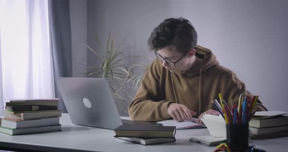 Excited Caucasian Nerd Boy Typing Fast on Laptop Keyboard. Absorbed ...