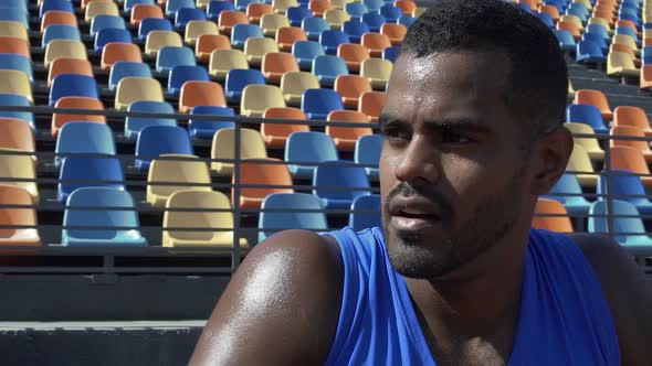 Sweaty Athlete Resting Restoring Strength and Breathing After Grueling ...