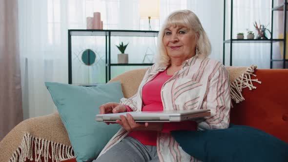 Senior Grandmother Woman Using Laptop Computer Typing at Home Room ...