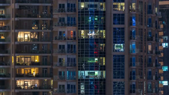 Glowing Windows in Multistory Modern Glass Residential Building Light ...
