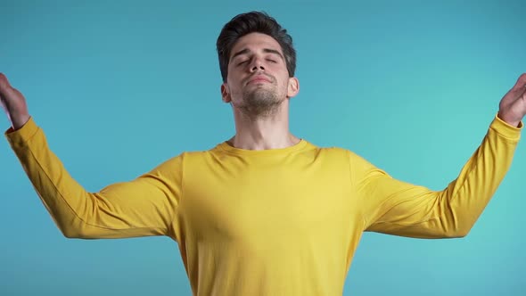 Calm student guy or businessman relaxing, meditating. Handsome european ...