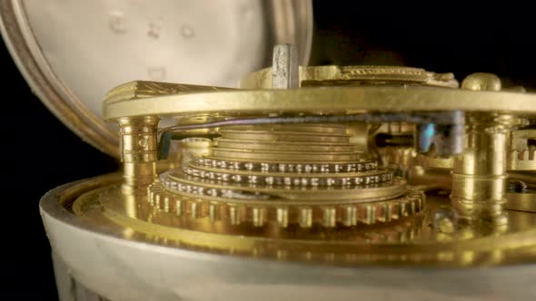 Inside View of a Moving Clockwork of Golden Mechanical Clock on Black ...