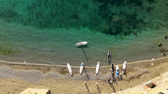 Sup surfing group aerial view 4 K Turkey Alanya, Stock Footage | VideoHive