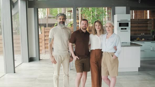Happy Upper-Class Family Posing in Modern House, Stock Footage | VideoHive