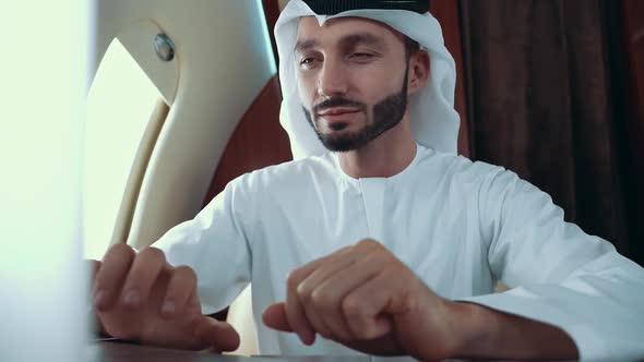 Arabian man flying on his Private jet to dubai., Stock Footage | VideoHive