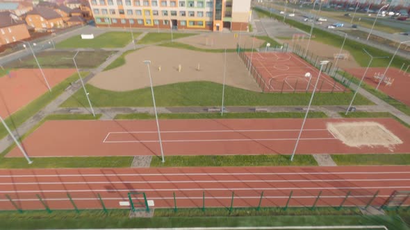 Sports Grounds and Running Tracks Near Gymnasium Building, Stock Footage