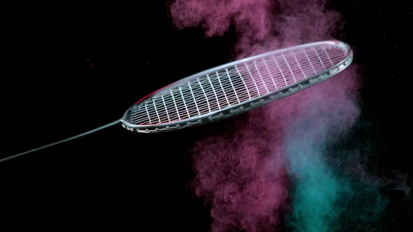 Super Slow Motion Shot of Hitting Badminton Shuttlecock Containing Neon ...