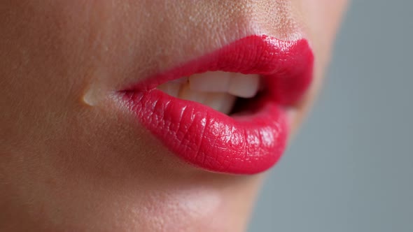 Woman with Bright Red Lips Crying. A Tear Runs Down Her Cheek ...