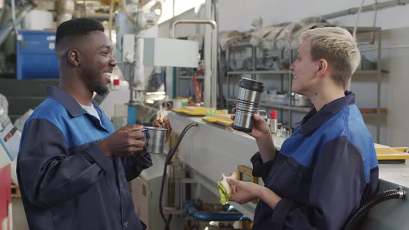 Cheerful Factory Workers Enjoying Lunch Break, Stock Footage | VideoHive