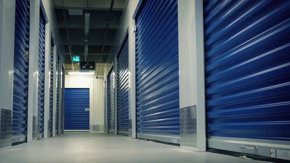 Moving Past Lockers in Storage Facility, Stock Footage | VideoHive