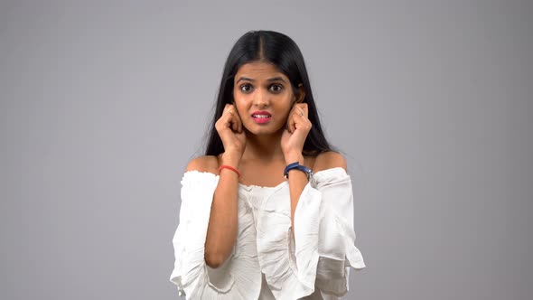 Sad Indian girl apologizing and saying sorry, Stock Footage | VideoHive