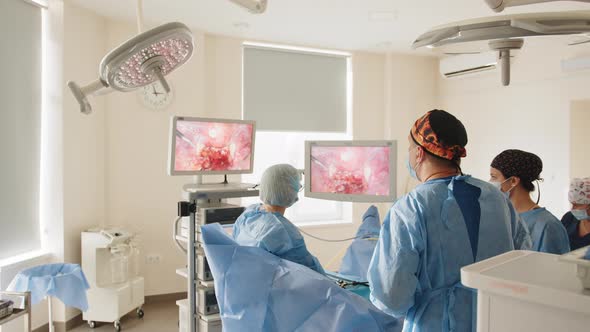 Laparoscopic Surgeon Looking at Monitor During Laparoscopic Surgery ...