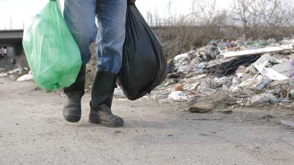 Male Legs Walking at Garbage Dump with Trash Bags, Stock Footage ...
