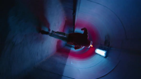 Man Running in Underground Tunnel and Doing Parkour Stunt, Stock Footage