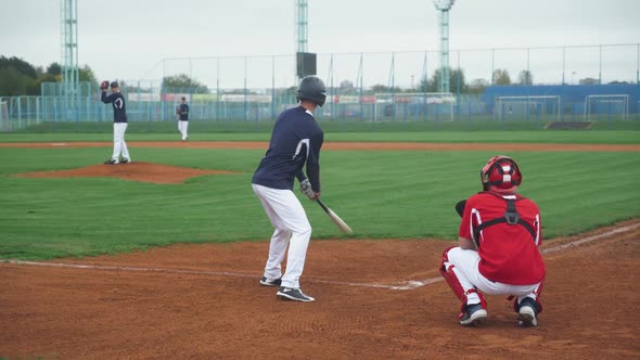 College Sports Guys Play Baseball the Pitcher Throws the Ball Towards ...