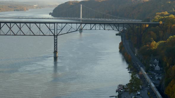 Aerial of walkway and Mid-Hudson Bridge over Hudson river, Stock Footage
