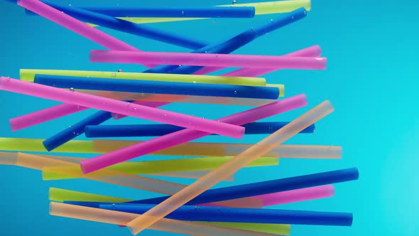 Floating Plastic Colorful Cocktail Tubes in the Ocean Throwing Garbage ...