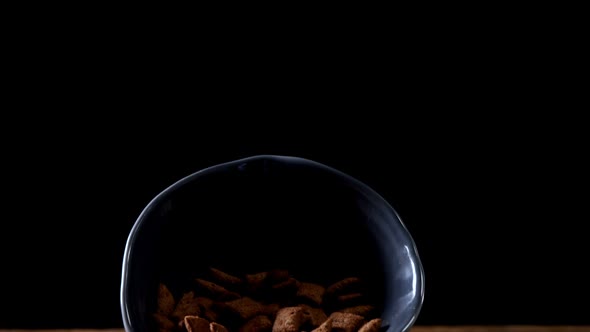 Chocolate toast crunch spilling out of bowl by Wavebreakmedia | VideoHive