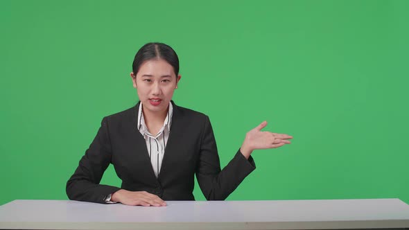 Live News Studio With Asian Female Anchor Pointing On Something While ...