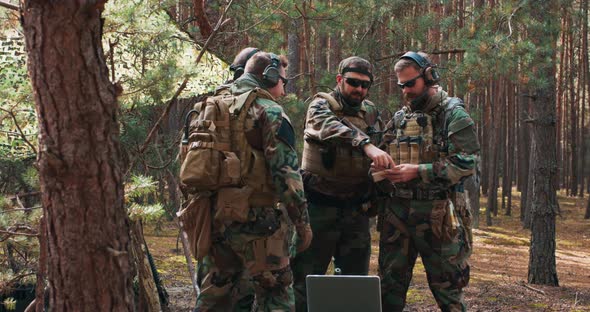 A Group of Soldiers in Military Uniform is Getting Ready to Go on ...