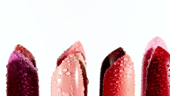 Colorful Lipstick Palette Rotation on White Background, Stock Footage