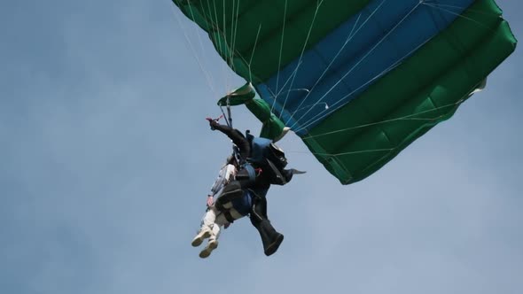 Parachutists in Tandem Flying in the Sky with a Parachute, Stock Footage