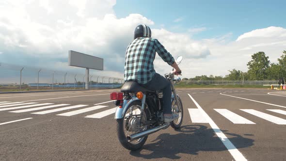 Young Man Riding Custom Motorcycle on Street Road Slow Motion, Stock ...