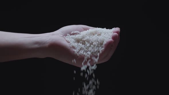 Rice Grains Falling From Hand, Stock Footage | VideoHive