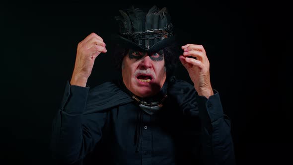 Upset Sinister Man with Horrible Scary Halloween Witcher Makeup Raising ...
